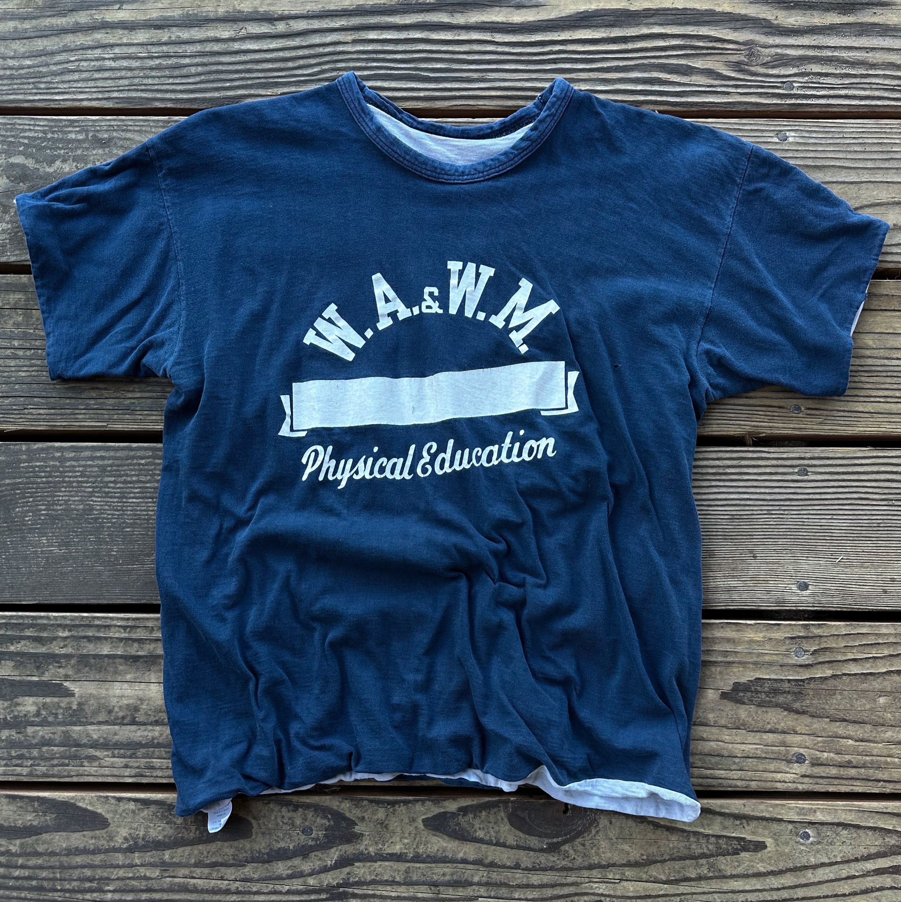 1970’s champion blue bar P.E. – Arachnid Vintage